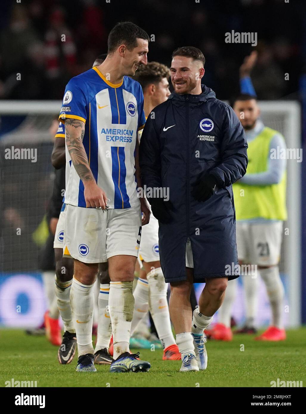 Brighton and Hove Albion's Lewis Dunk (left) and Alexis Mac Allister ...