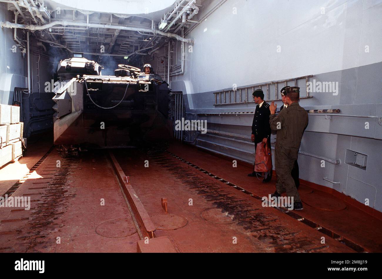 An amphibious assault vehicle (AAV) from the 3rd USMC Division is ...