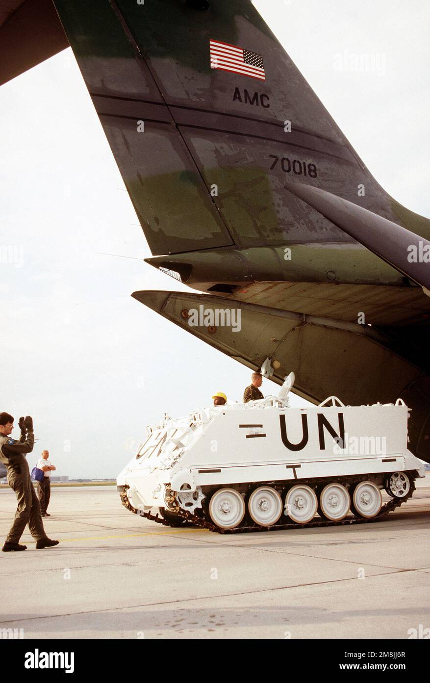 STAFF SGT. Jeffrey R. Spear, 7th Airlift Squadron, McChord AFB, directs ...
