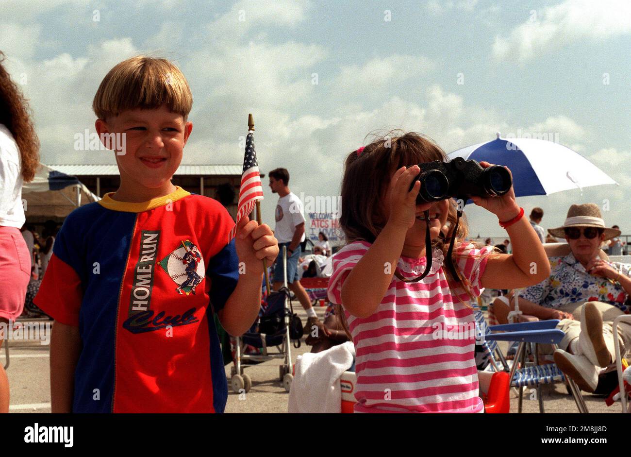 Chad and Ashley Deweese keep a look out for their father, ABE2 Matt ...
