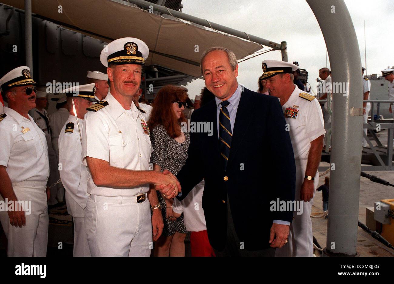 The commanding officer of the guided missile cruiser USS PHILIPPINE SEA ...
