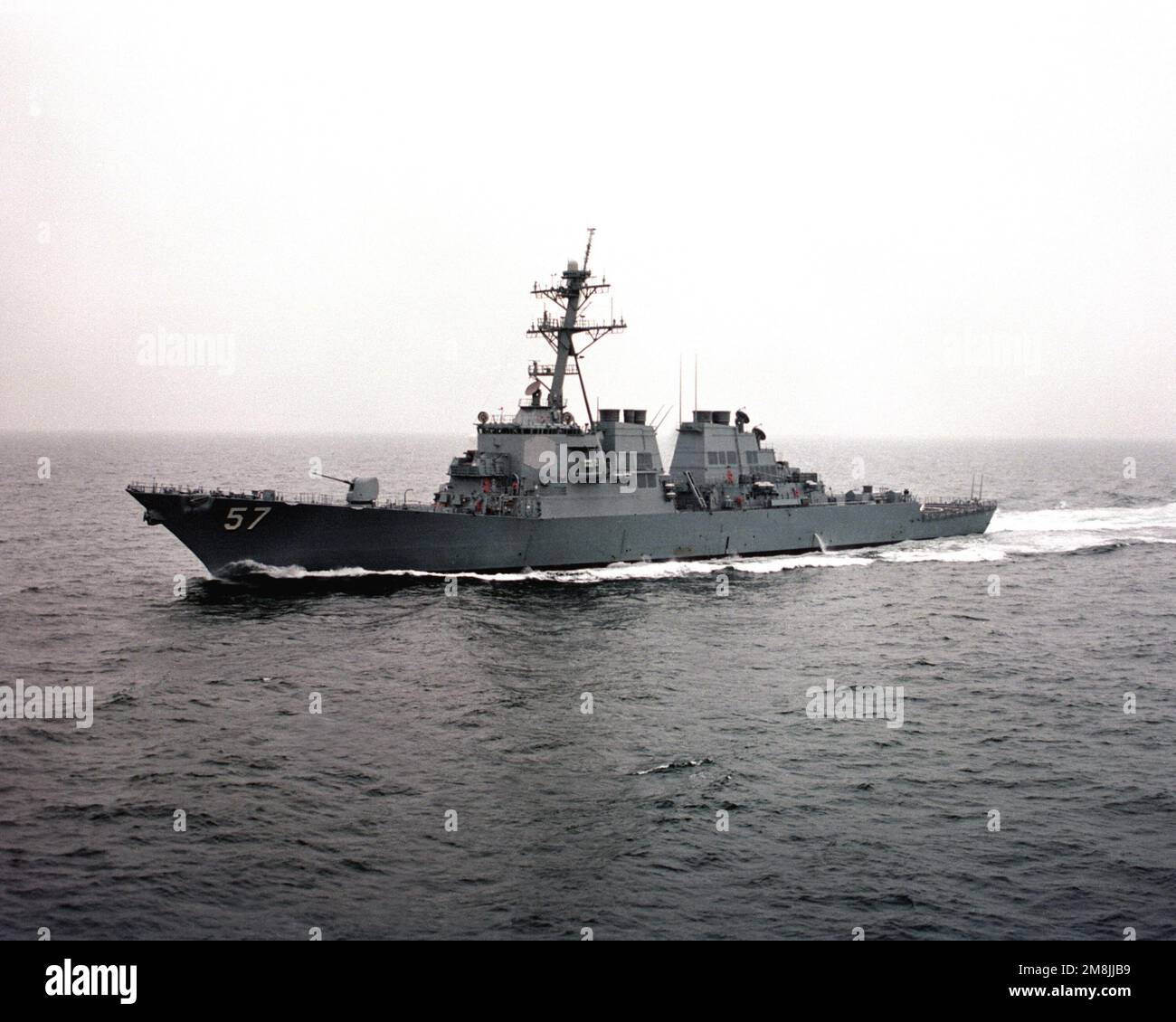 An aerial port beam (off centerline) view of the guided missile ...