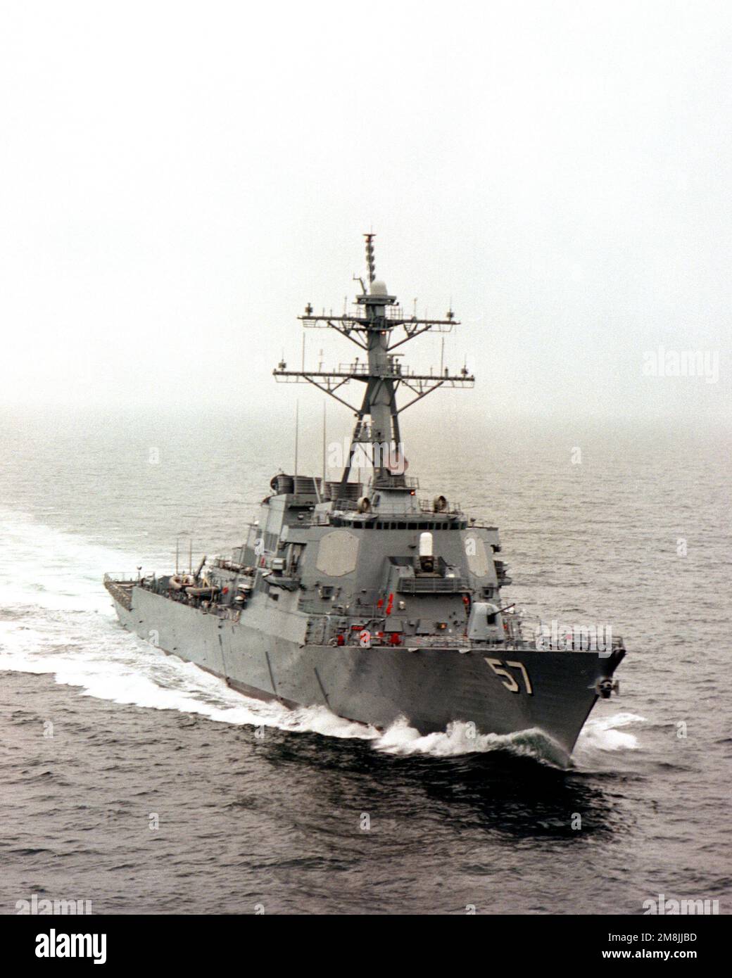 An aerial starboard bow view of the guided missile destroyer USS ...
