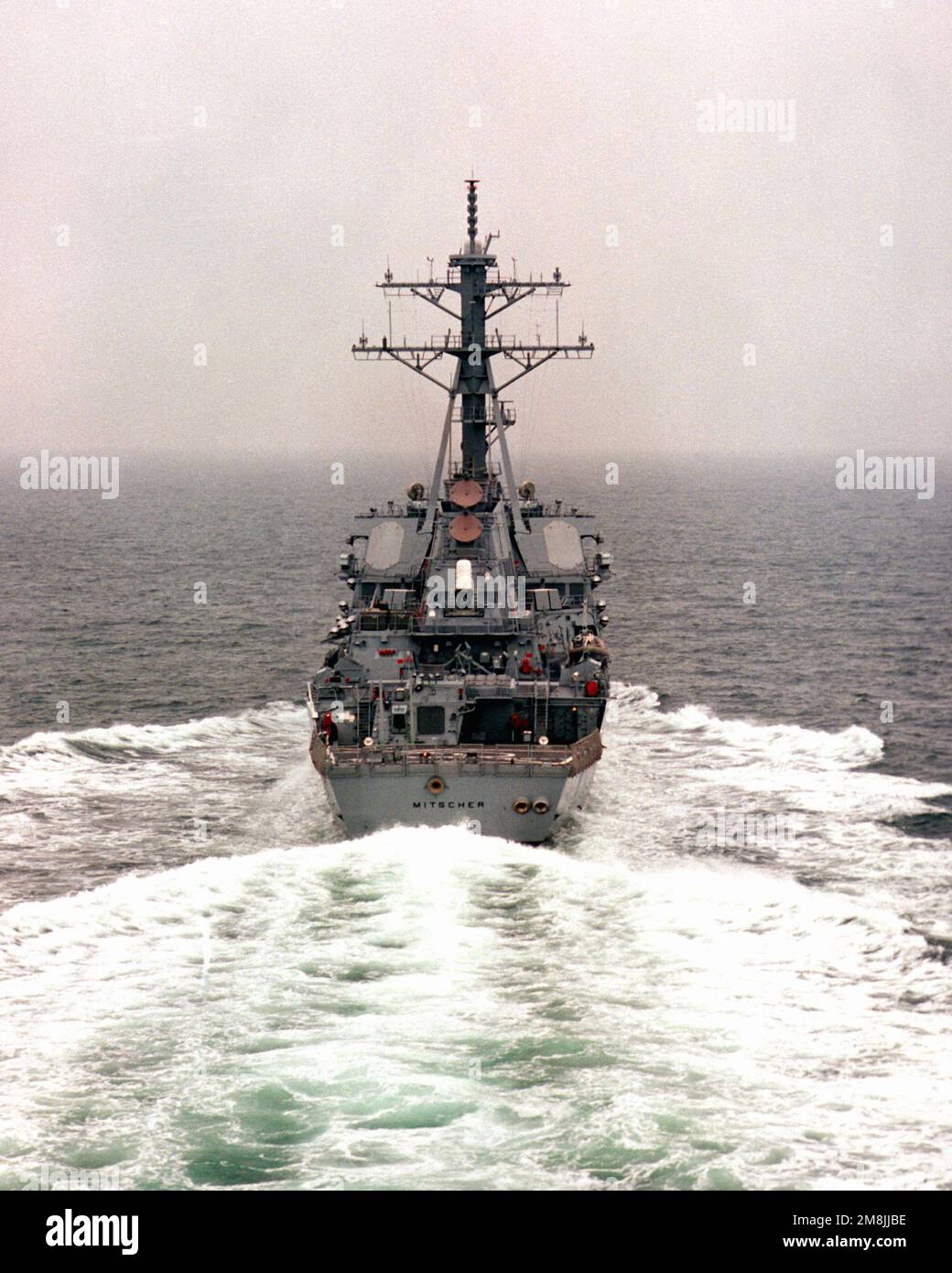 An aerial stern-on view of the guided missile destroyer USS MITSCHER ...