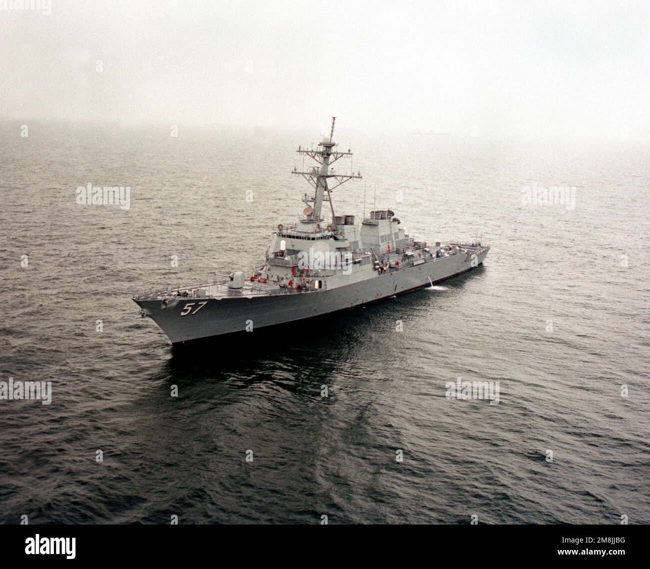 An aerial port bow view of the guided missile destroyer USS MITSCHER ...