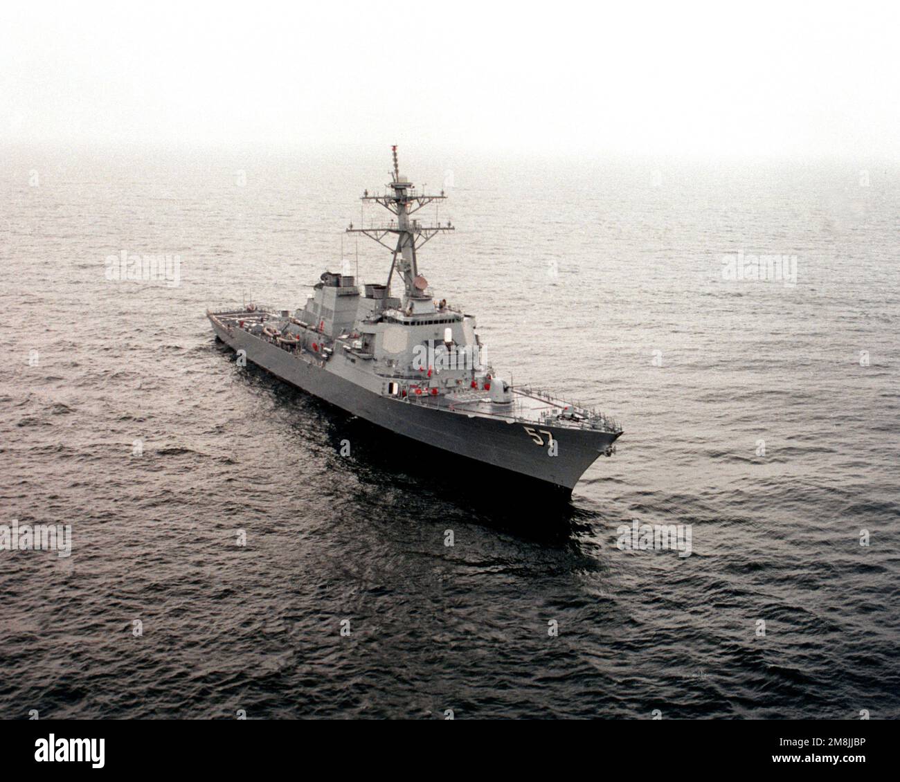 An aerial starboard bow view of the guided missile destroyer USS ...