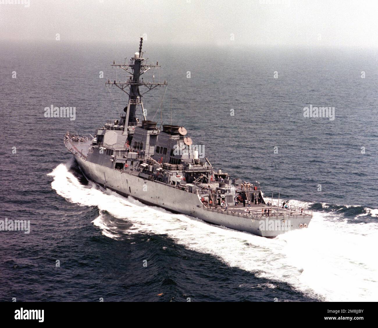 An aerial port quarter view (135 degrees off centerline) of the guided ...