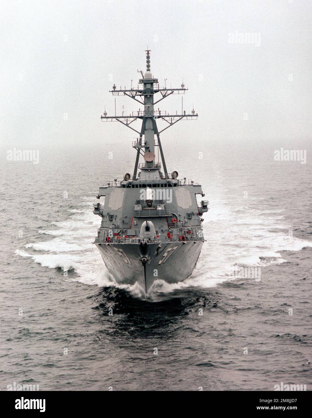 An aerial bow-on view of the guided missile destroyer USS MITSCHER (DDG ...
