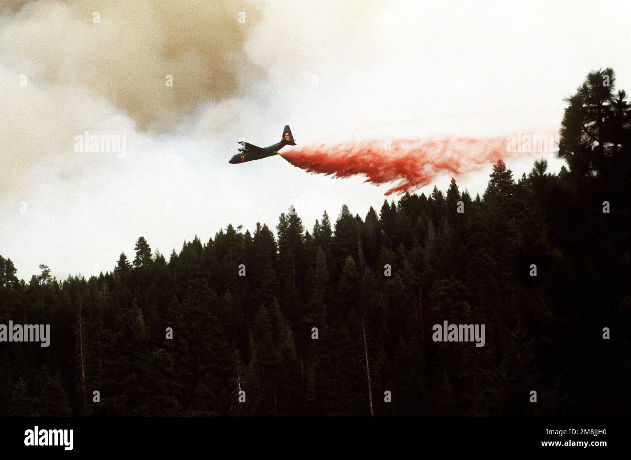 Modular Airborne Fire Fighting System 2 lays Phoschek retardant in ...