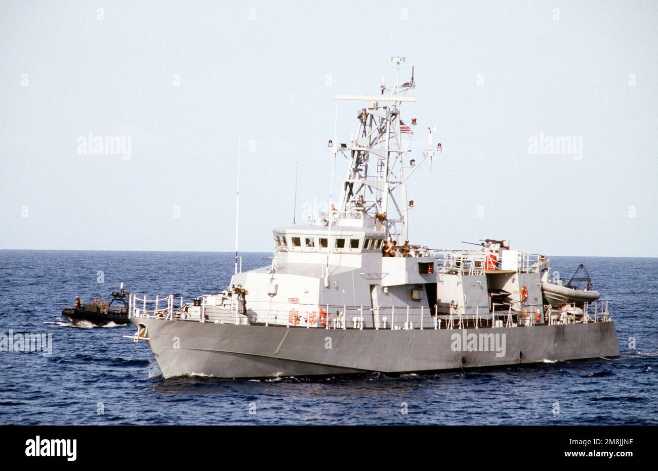 A port bow view of the coastal patrol ship USS CYCLONE (PC-1 ...