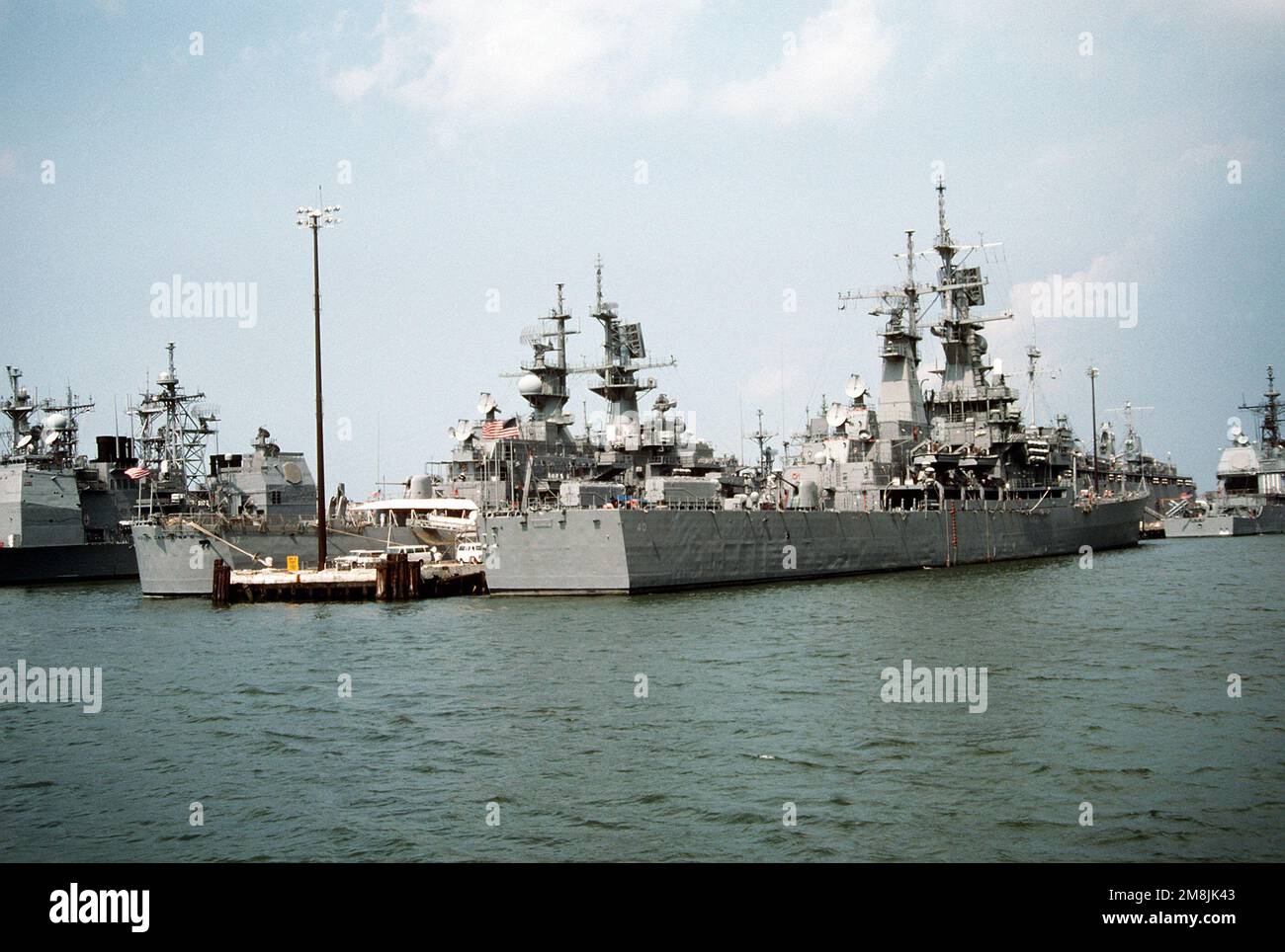 A comparison starboard quarter view of the nuclear-powered guided ...