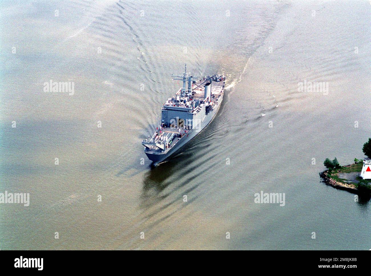 An aerial port bow view of the tank landing ship USS FAIRFAX COUNTY ...