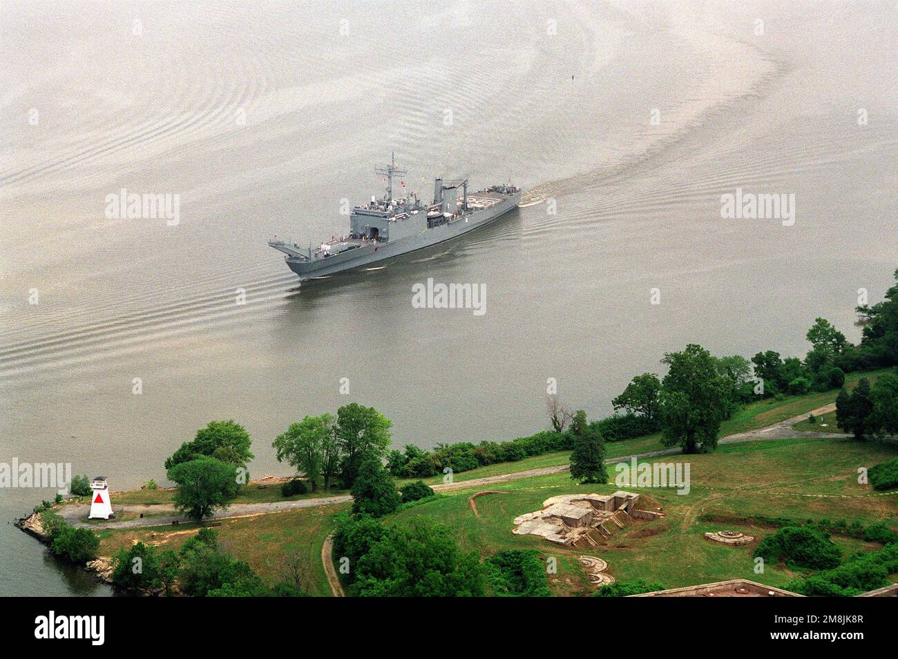 An aerial port bow view of the tank landing ship USS FAIRFAX COUNTY ...