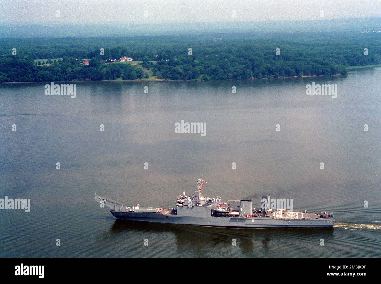 An aerial port side view of the tank landing ship USS FAIRFAX COUNTY ...