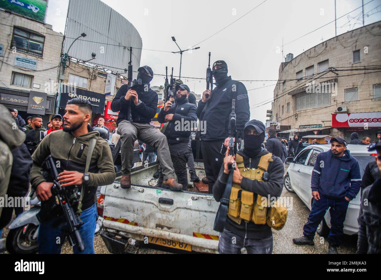Jenin, Palestine. 14th Jan, 2023. Palestinian gunmen take part during ...