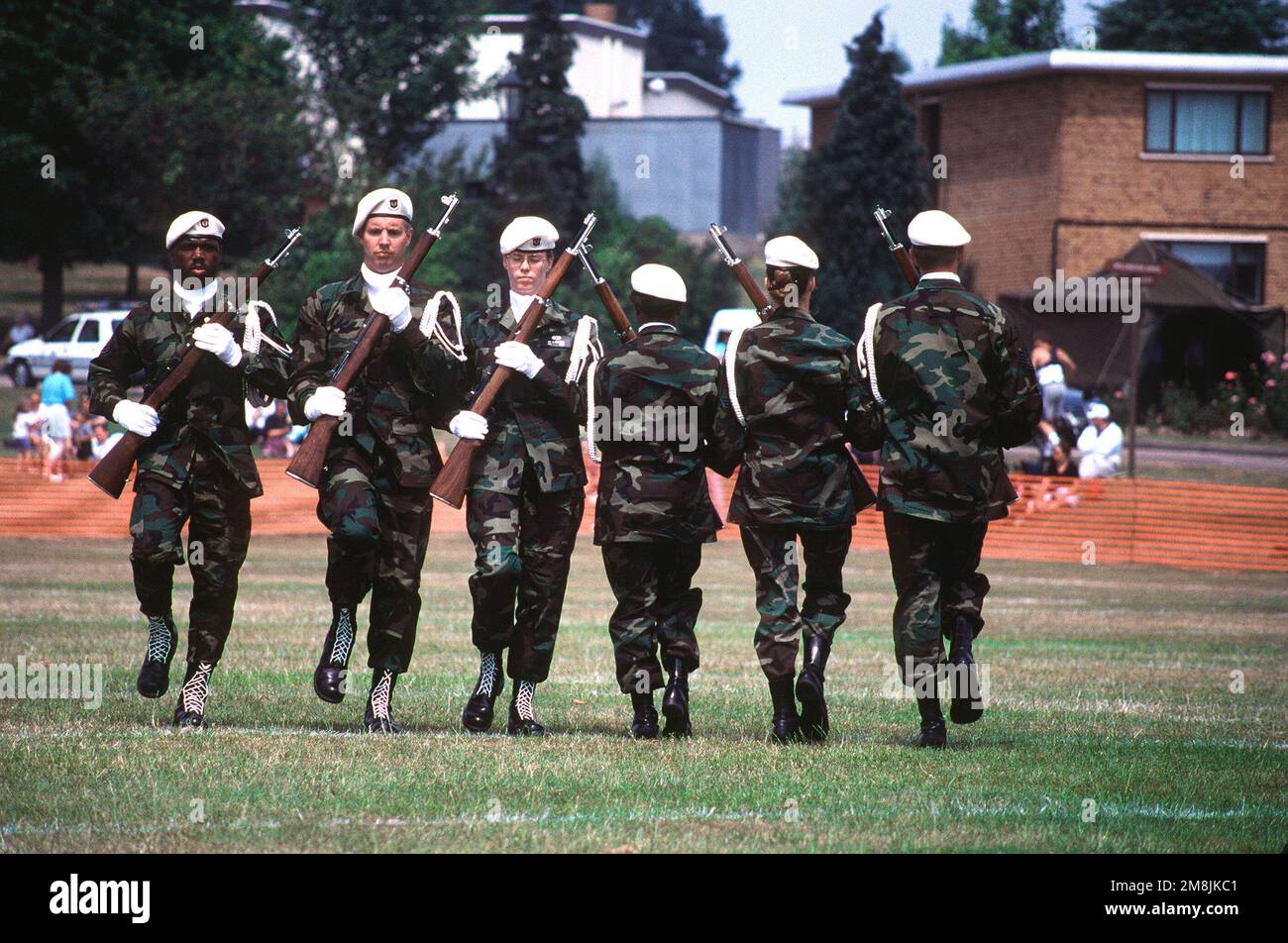The RAF Chicksand's drill team performs precision drill movements for ...