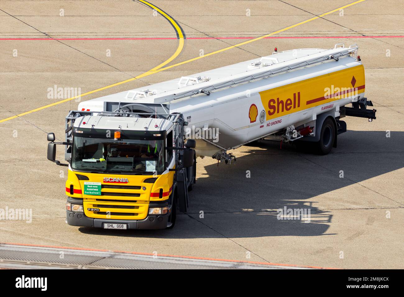 Scania P270 truck Shell kerosine refueling vehicle driving on the ...