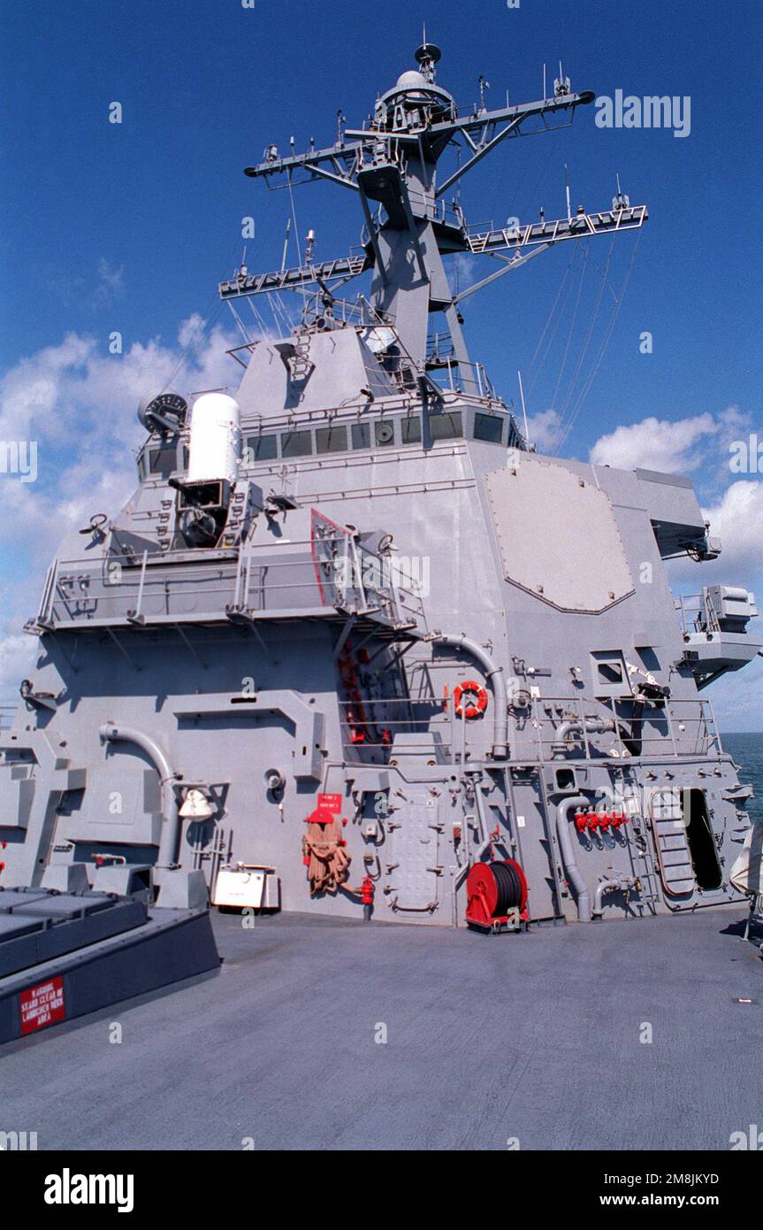 A close in view of the port side of the bridge of the guided missile ...