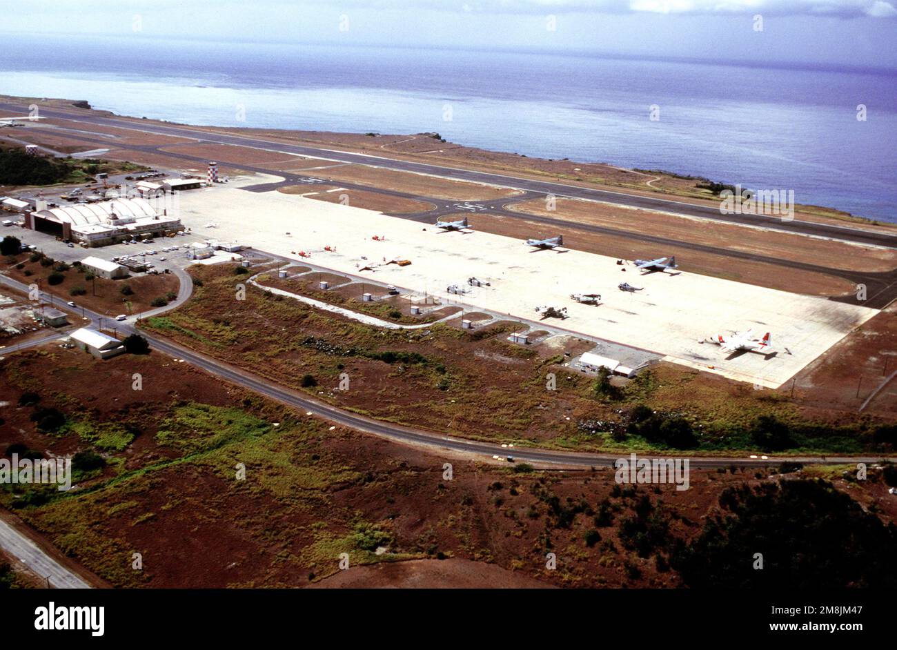 Aerial view of the Leeward Point Airfield ramp and runway looking ...