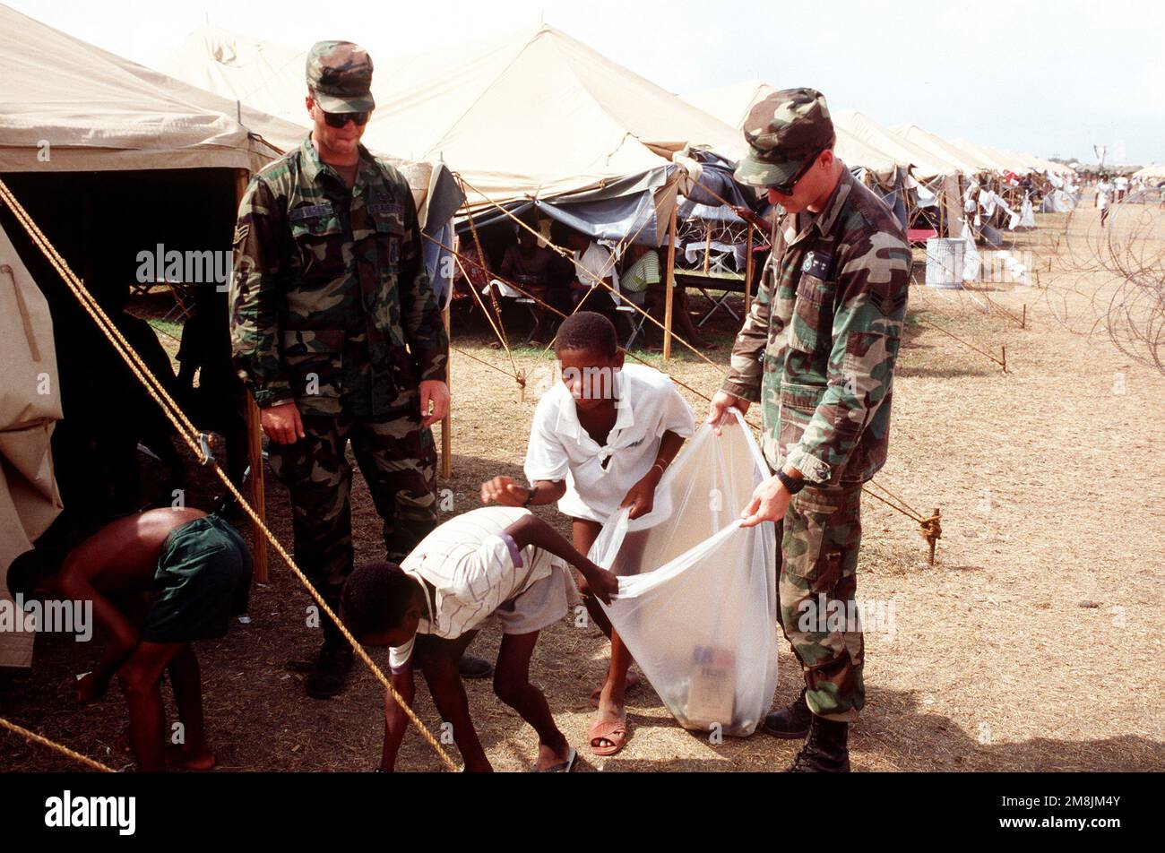 AIRMAN 1ST Class Jeff Leyshon (left) and Samuel Crow (right) from the ...