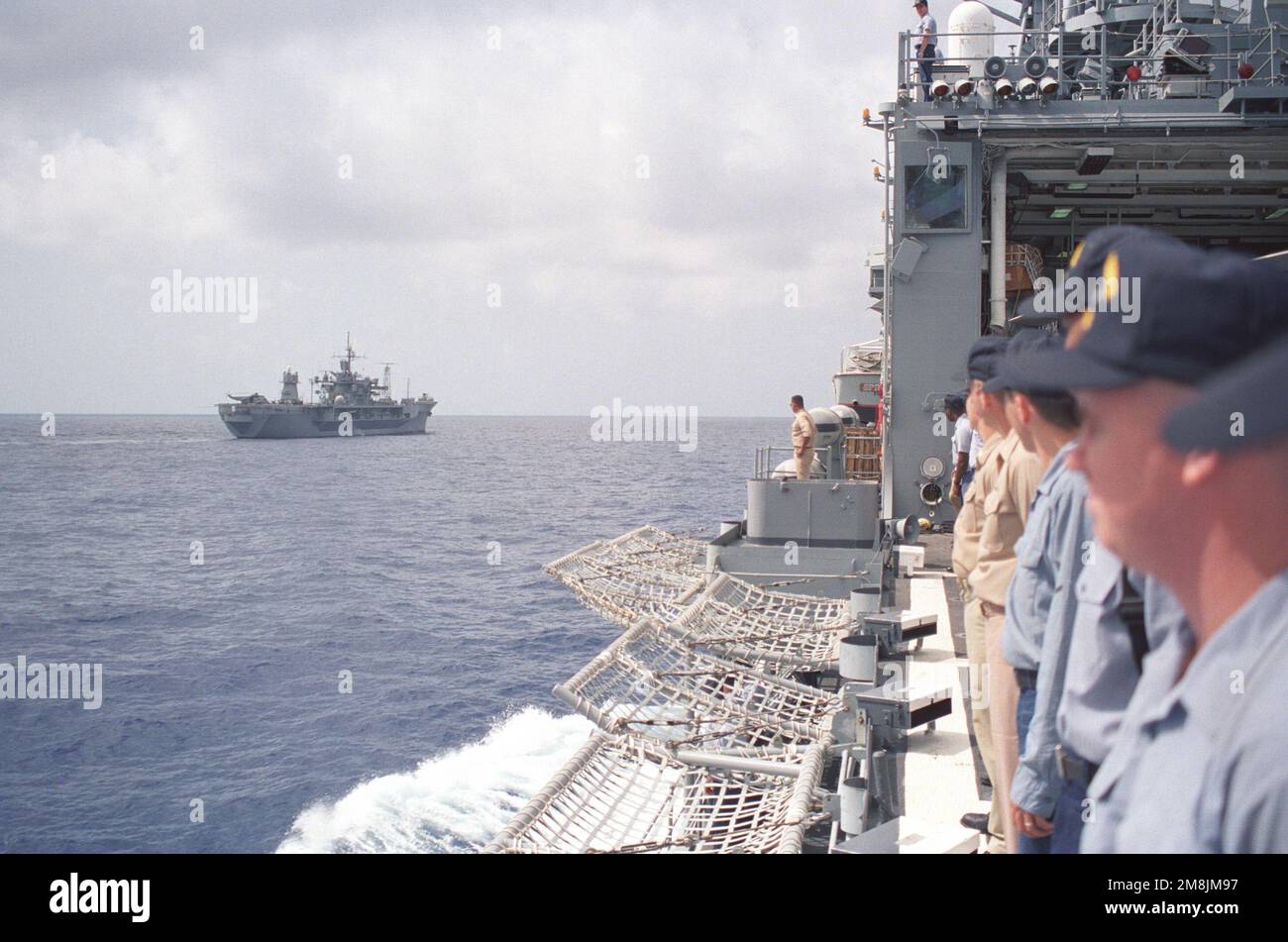 Sailors man the rail on board the destroyer USS SPRUENCE (DD-963 ...