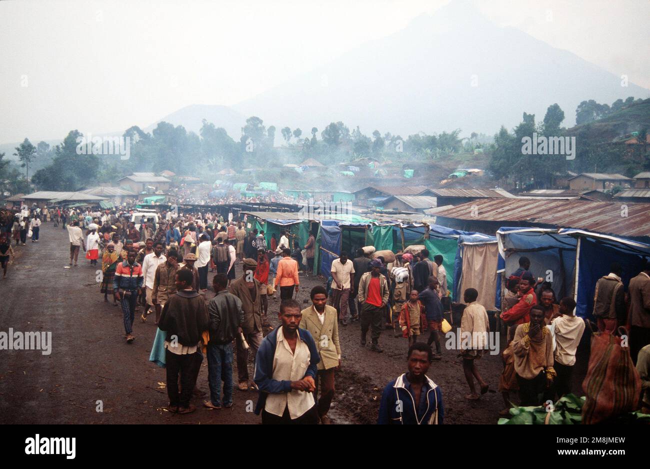 A view of the Kibumba refugee camp showing makeshift houses and some of ...