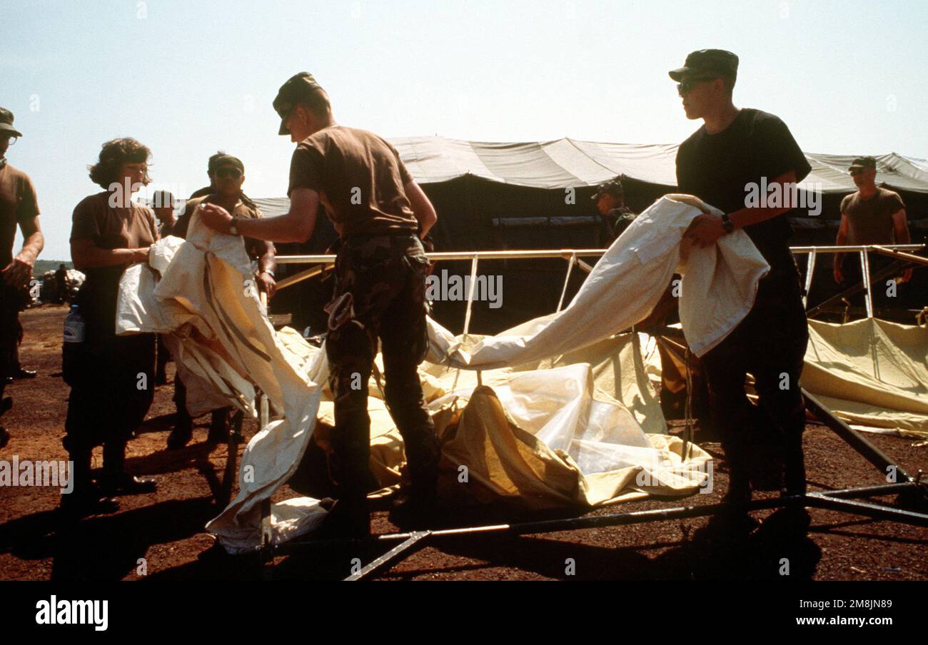 Members of the 86th Medical Group Ramstein Air Base, Germany, set up a ...