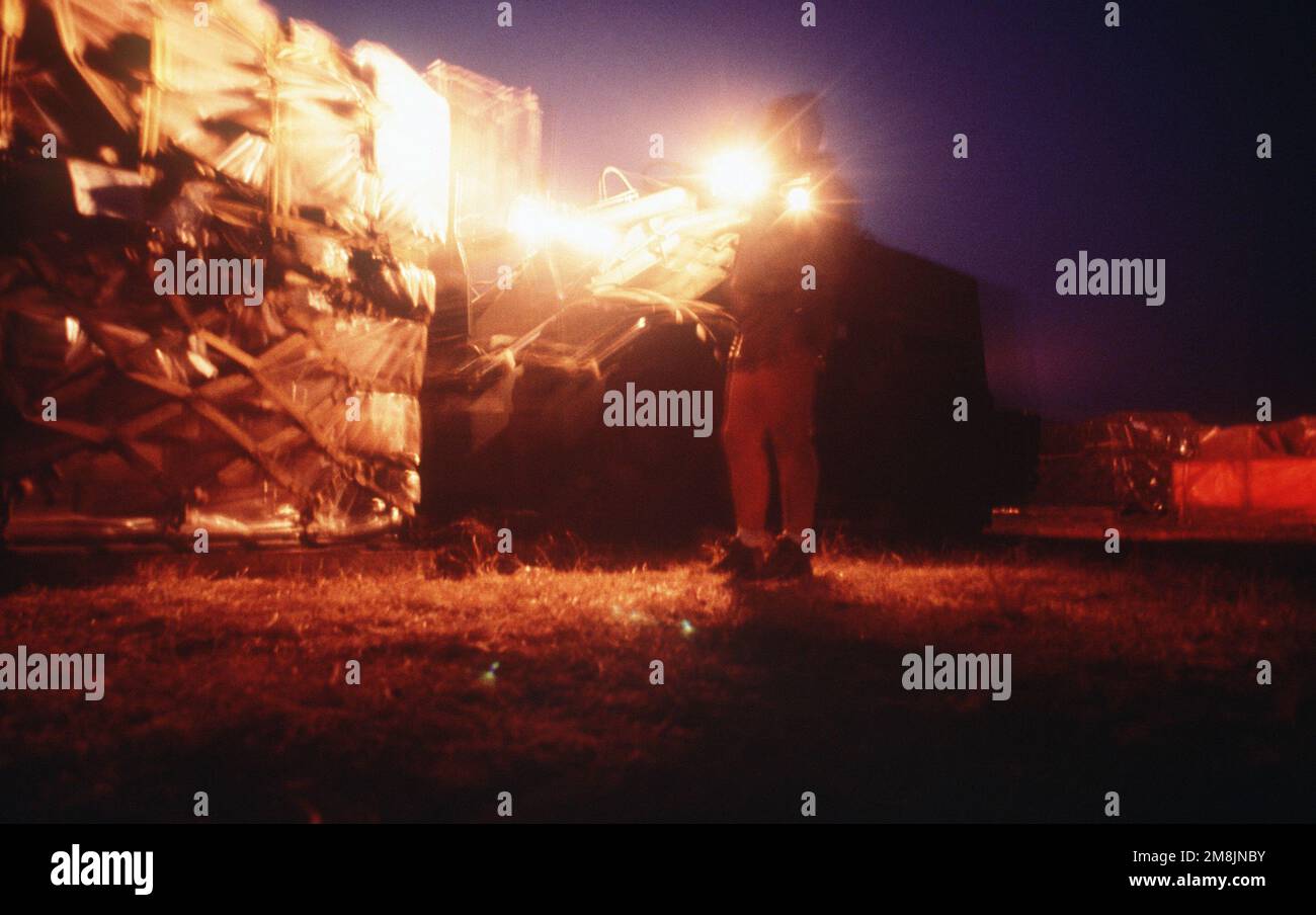 Members of the 314th TALCE, Little Rock AFB, Ark, conduct night cargo ...