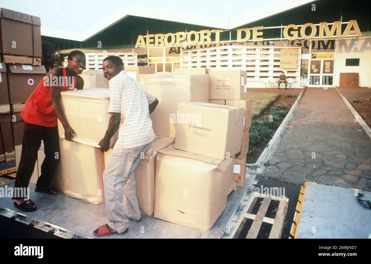 Relief goods are loaded on a truck at Goma Airport. Subject Operation ...