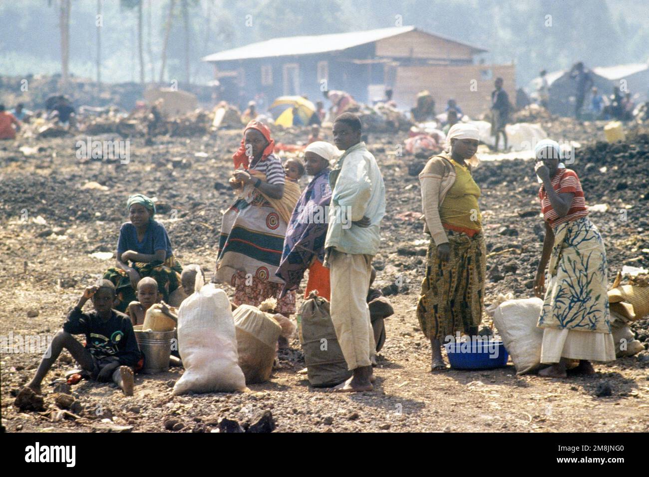 Rwandan refugees who have come to Goma after a civil war erupted in ...