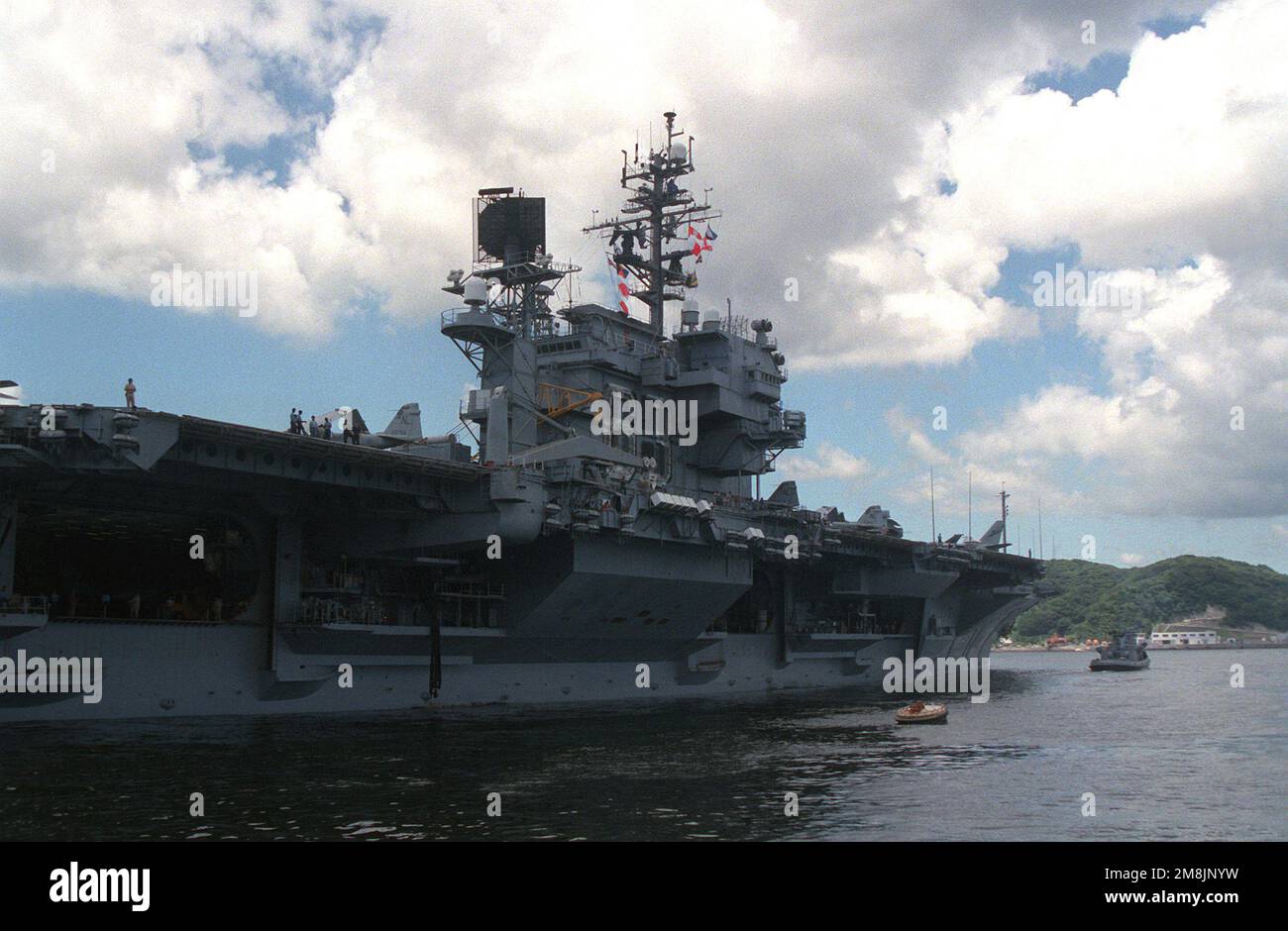 Close in starboard quarter view of the aircraft carrier USS KITTY HAWK ...