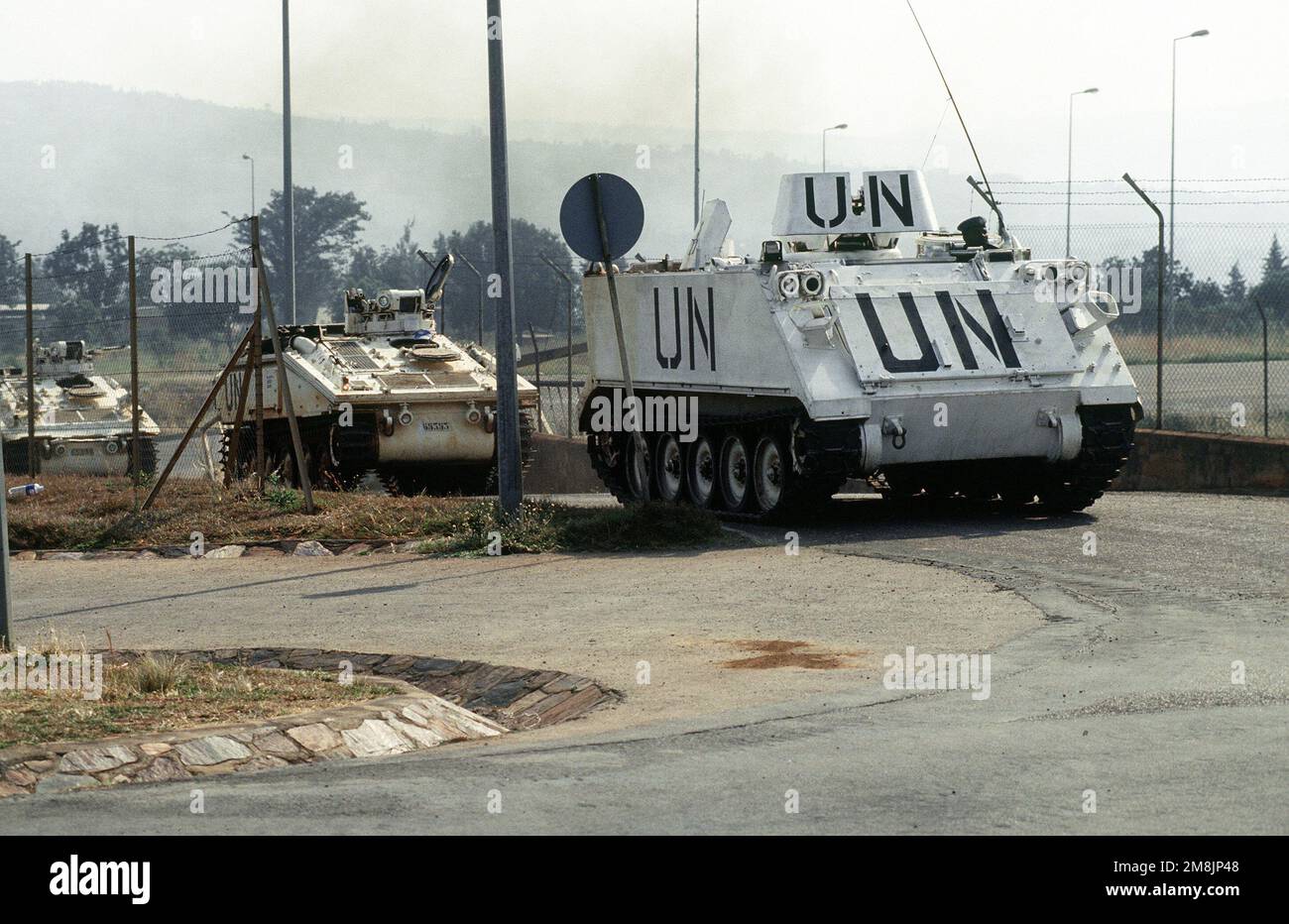 United Nations personnel in a M113A2 personnel carrier patrol the ...