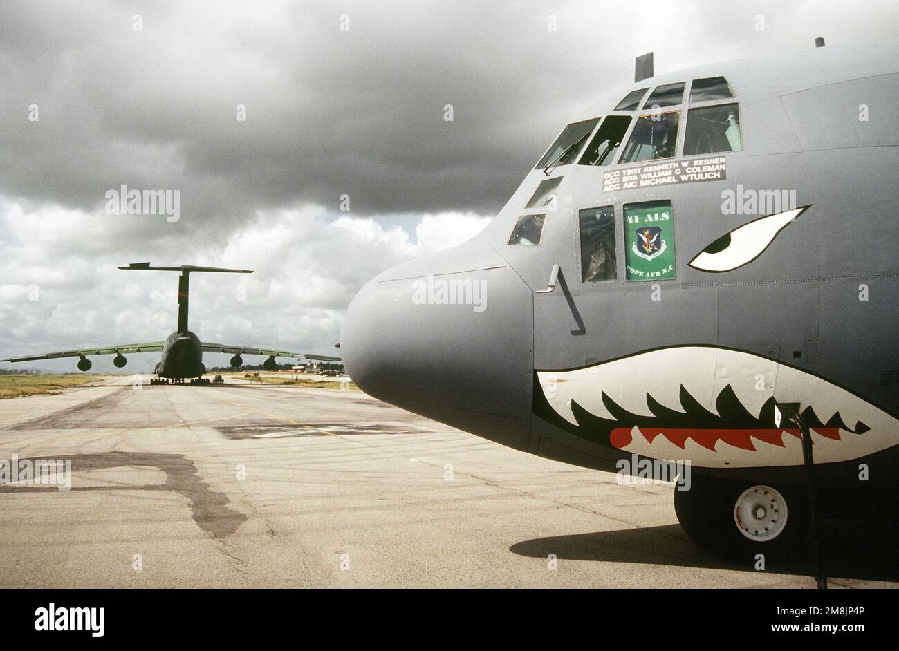 In the foreground a nose section of a C-130 Hercules from the 41st ...