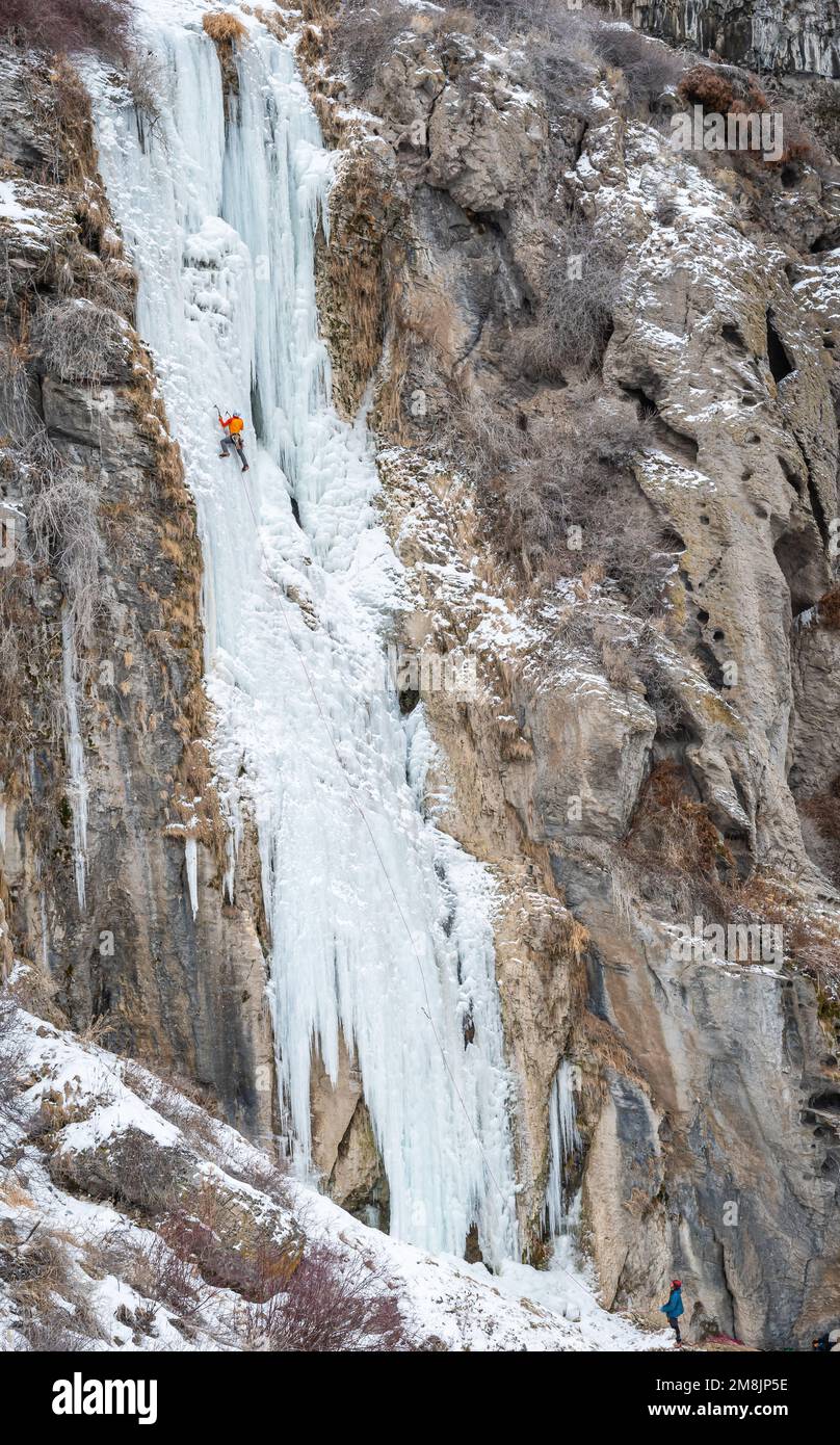 Greg Moore ice climbing Lower Falls Right which is rated WI4 Stock ...