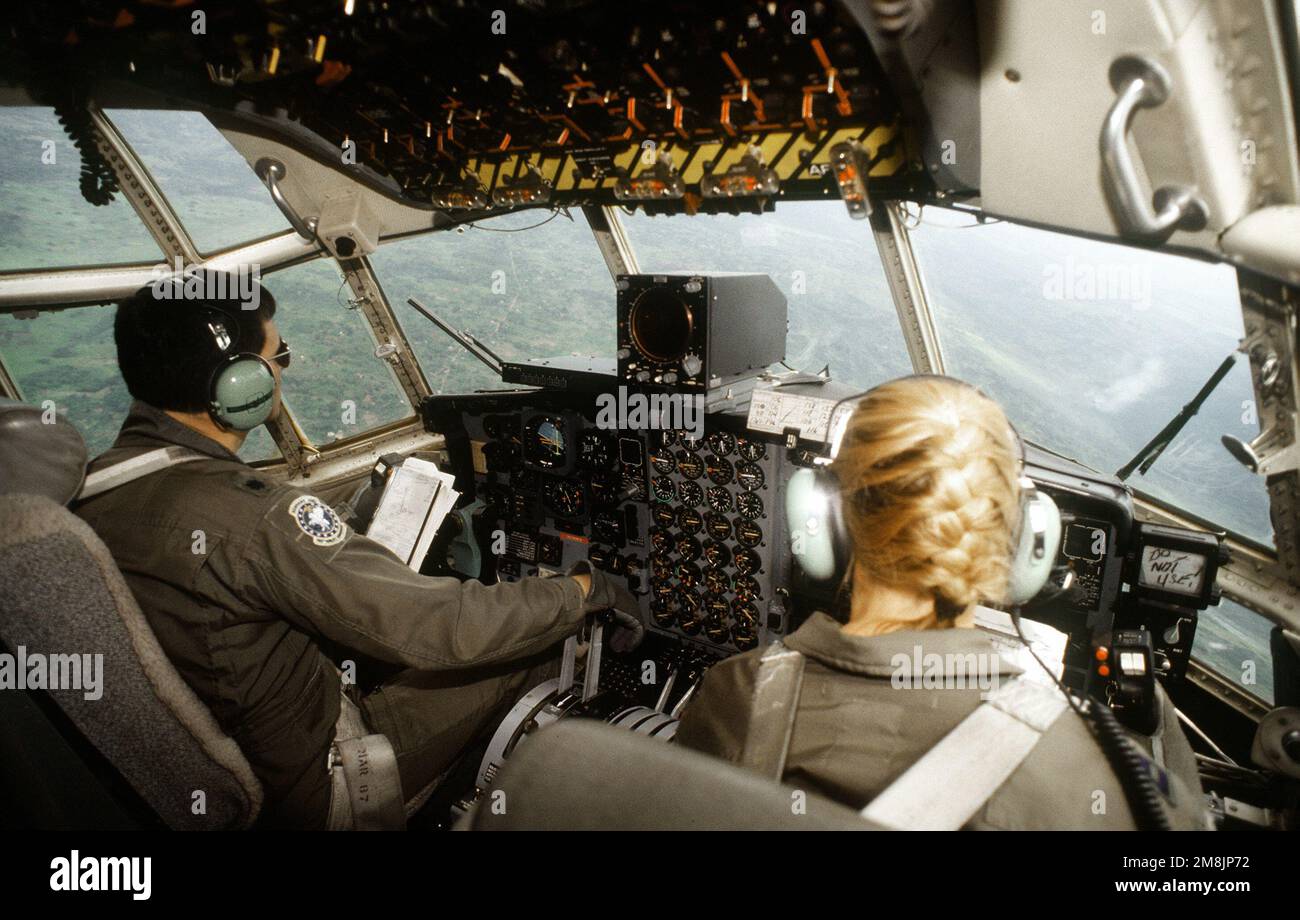 In cockpit of an Air National Guard C-130 Hercules, Aircraft Commander ...