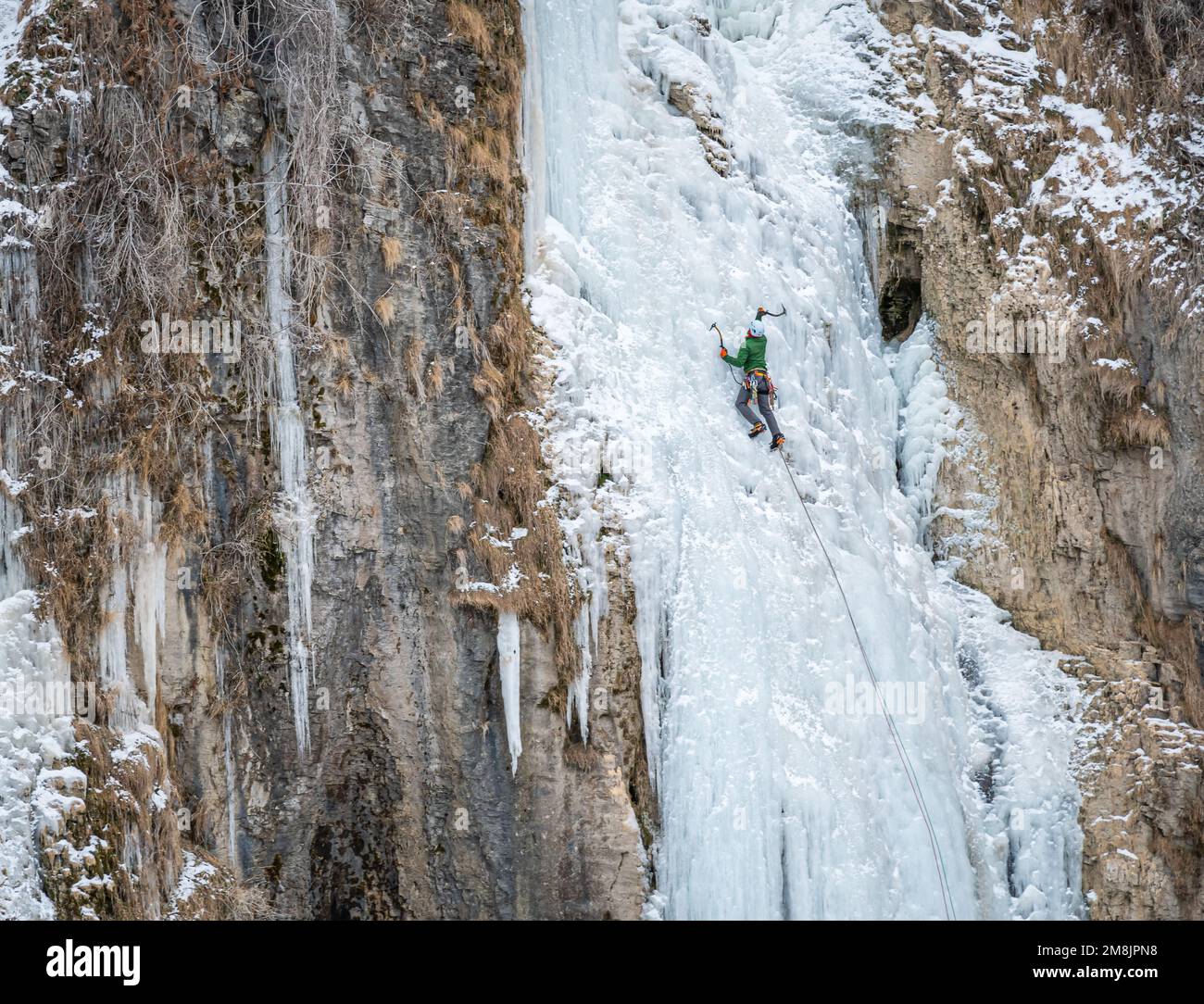 Greg Moore ice climbing Lower Falls Right which is rated WI4 Stock ...