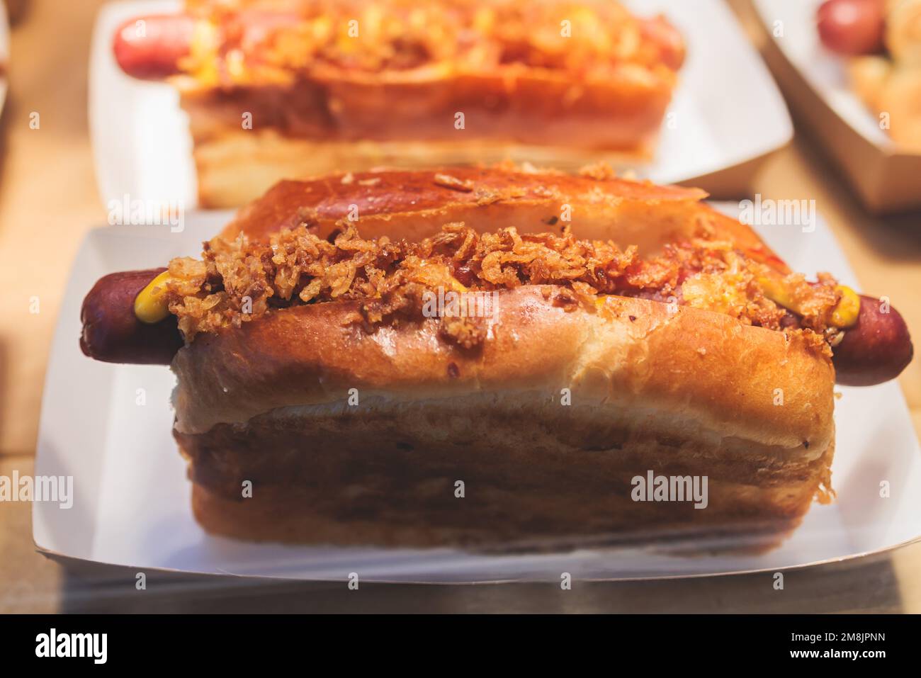 Hot dogs snacks on a table, variety of different hot dog with a sausage ...