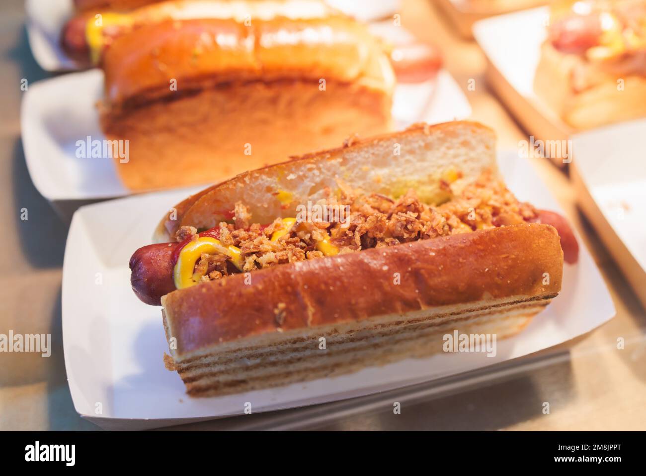 Hot dogs snacks on a table, variety of different hot dog with a sausage ...
