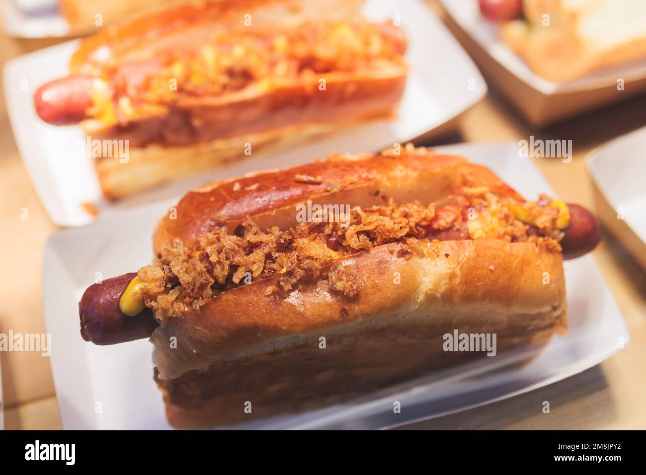 Hot dogs snacks on a table, variety of different hot dog with a sausage ...