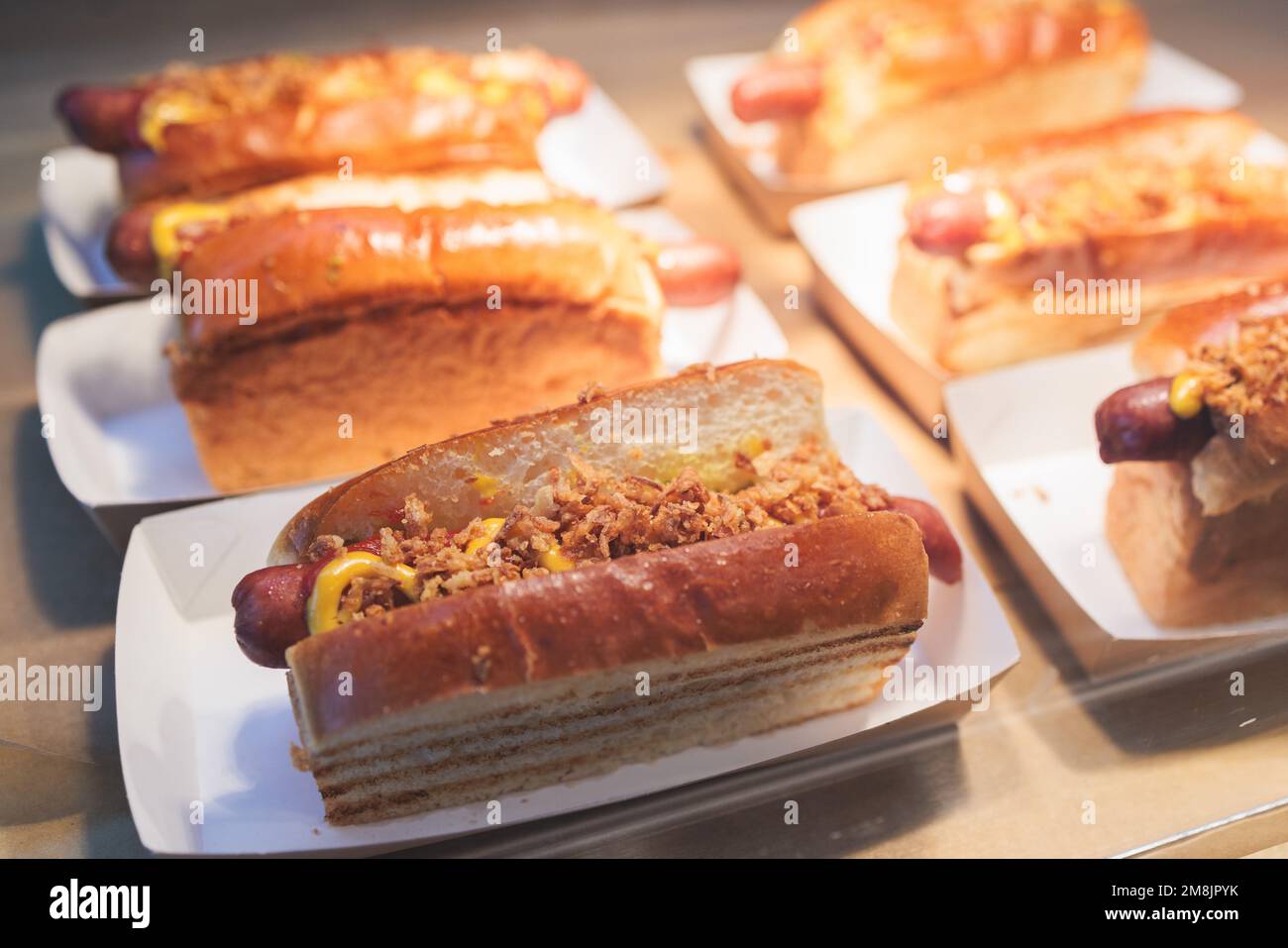 Hot dogs snacks on a table, variety of different hot dog with a sausage ...
