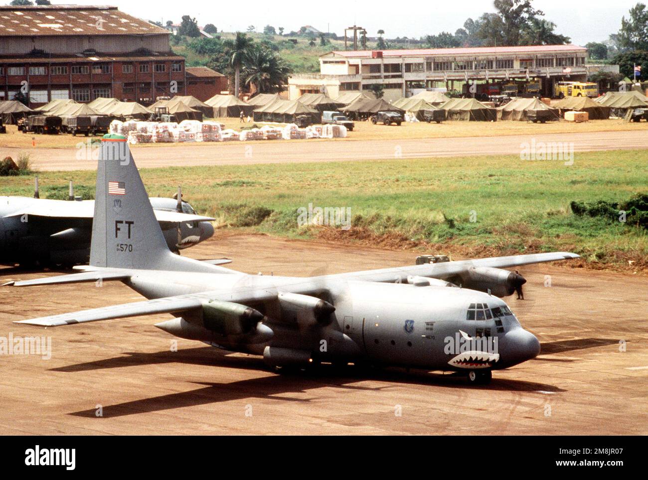 An overhead right side view of a US Air Force C-130 aircraft as it ...