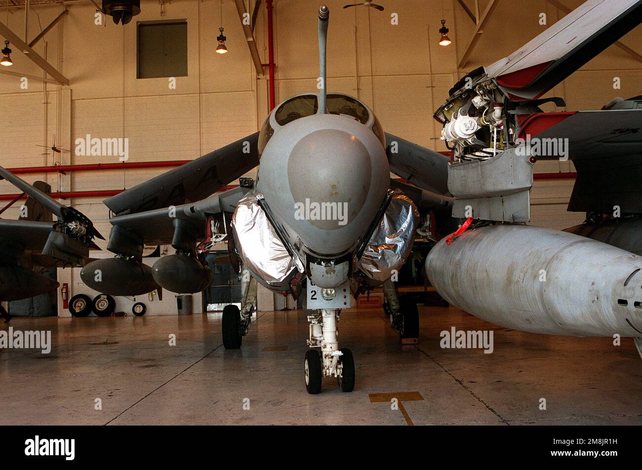 Three A-6E Intruder aircraft of Attack Squadron 35 (VA-35) are shown ...