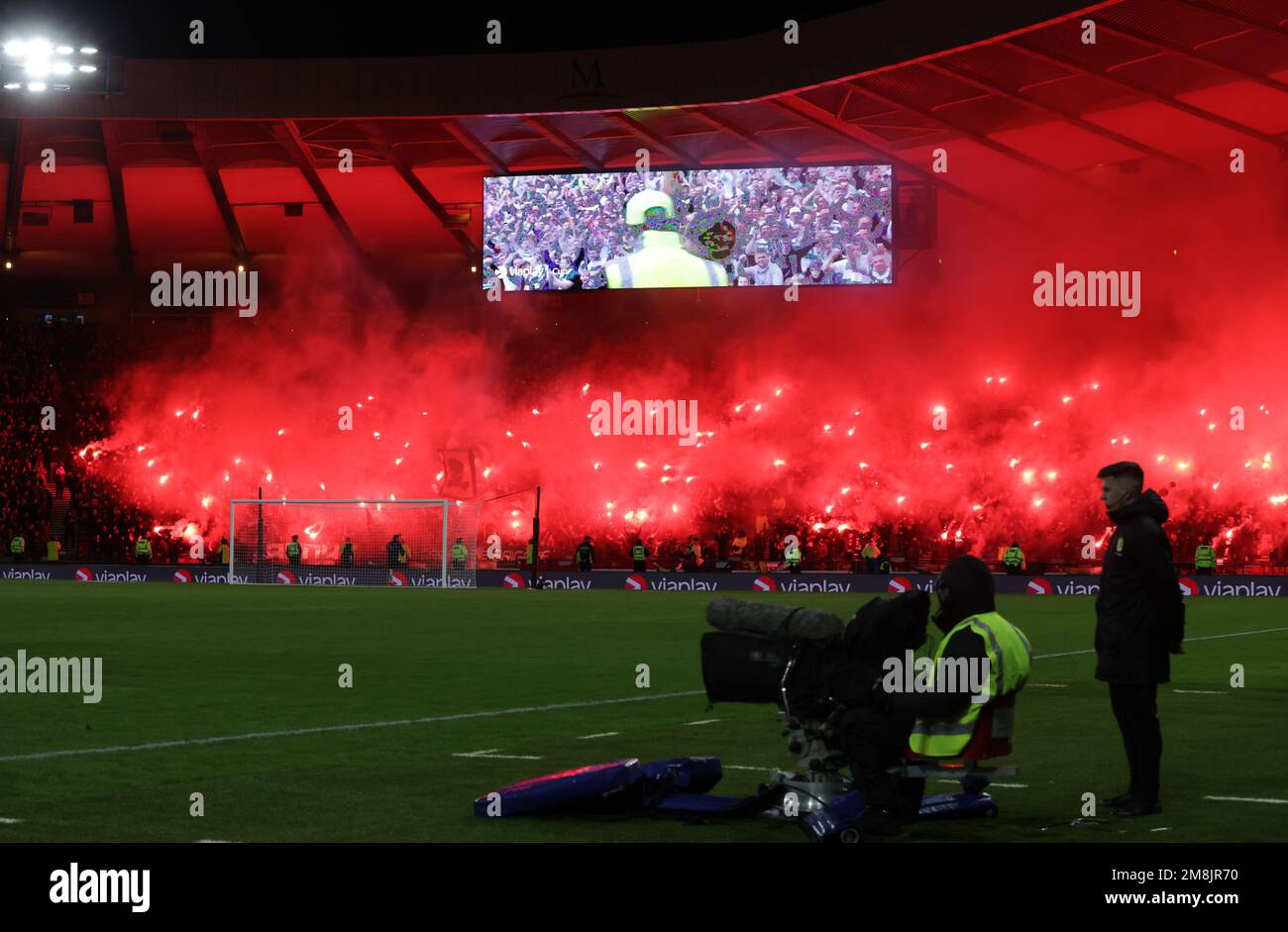 Celtic fans set off flares in the stands before the Viaplay Cup Semi ...