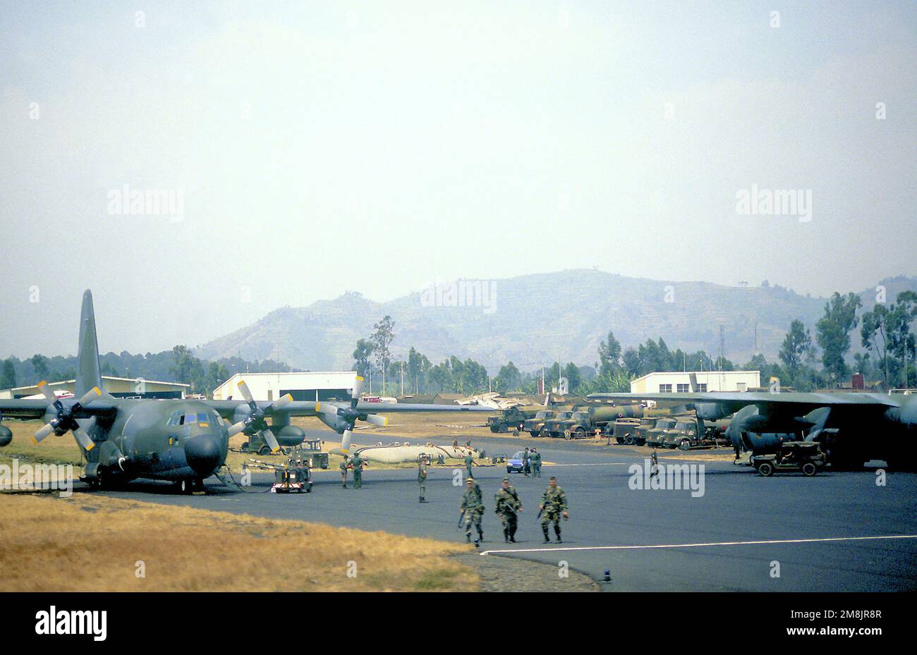 C-130 Hercules on the ramp after arriving at Entebbe Airport with food ...