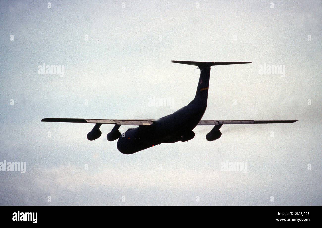 A 3/4 left rear view of a C-141 Starlifter from the 437th Airlift Wing ...