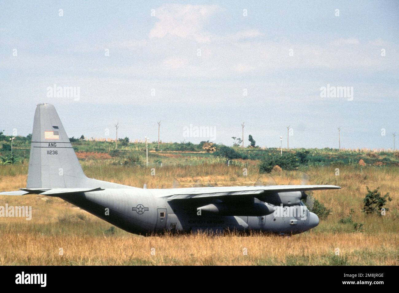 A C-130 Hercules aircraft arrives at Entebbe Airport loaded with ...
