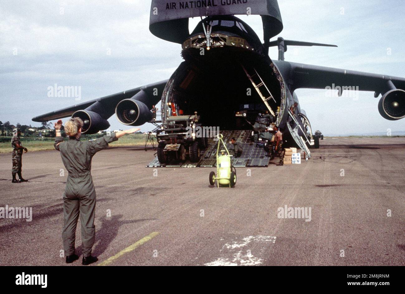 A C-5 Galaxy from the 105th Air Guard, Stewart ANG Base, NY, off loads ...