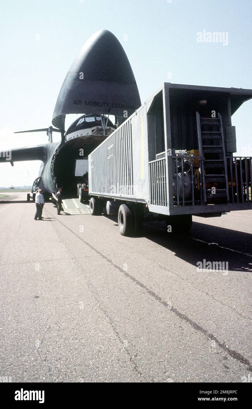 A C-5 Galaxy from the 105th Air Guard, Stewart ANG Base, NY, off loads ...