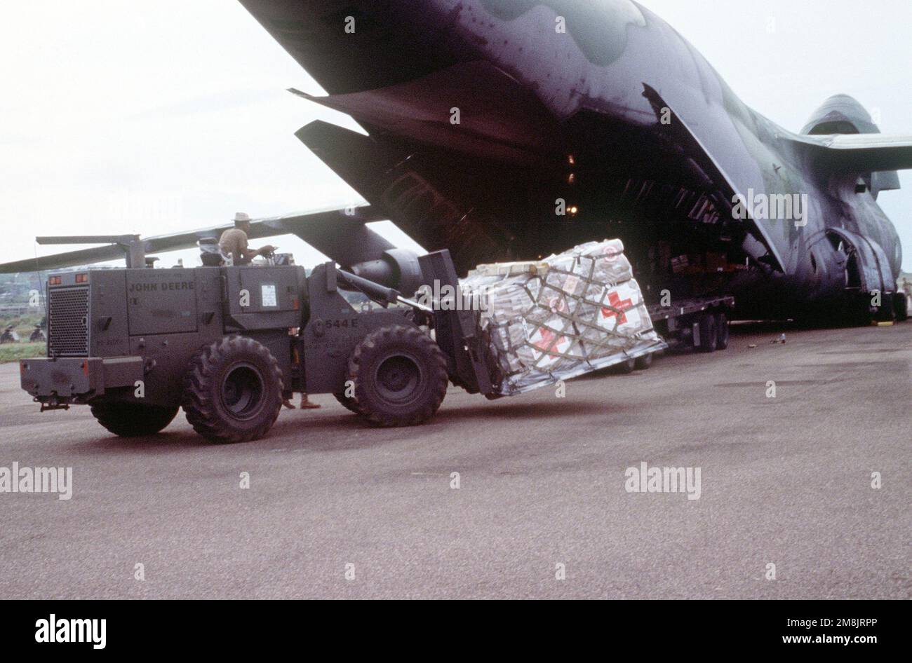 A C-5 Galaxy from the 105th Air Guard, Stewart ANG Base, NY, off loads ...