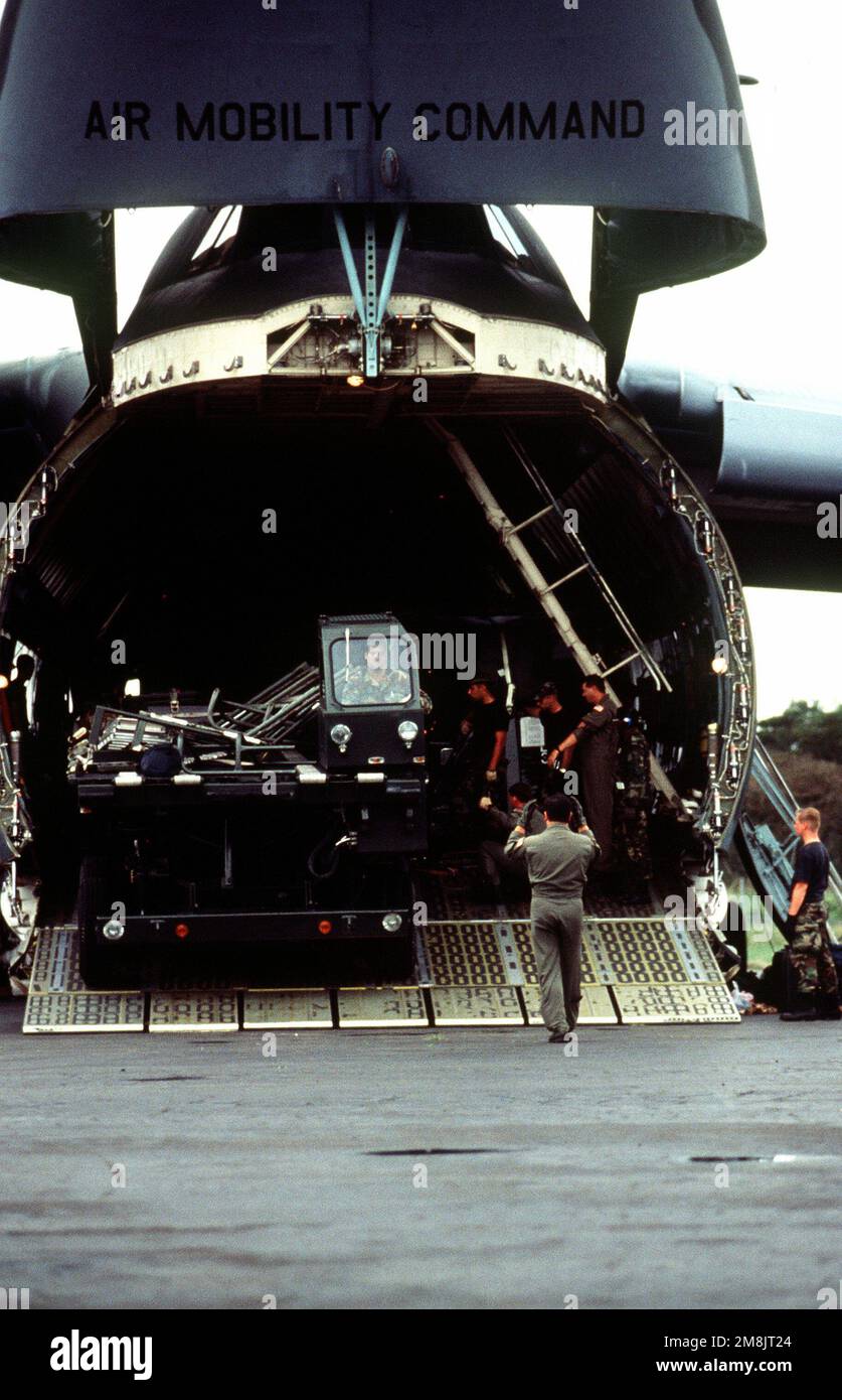 Members from the Tactical Air Lift Control Element (TALCE) deployed to ...